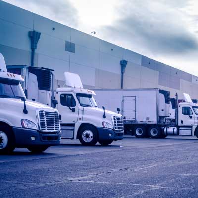 trucks-loading-dock - DTS Logistics